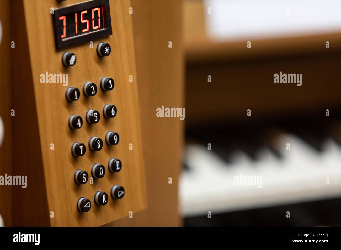 An electronic control pad of a modern organ Stock Photo - Alamy
