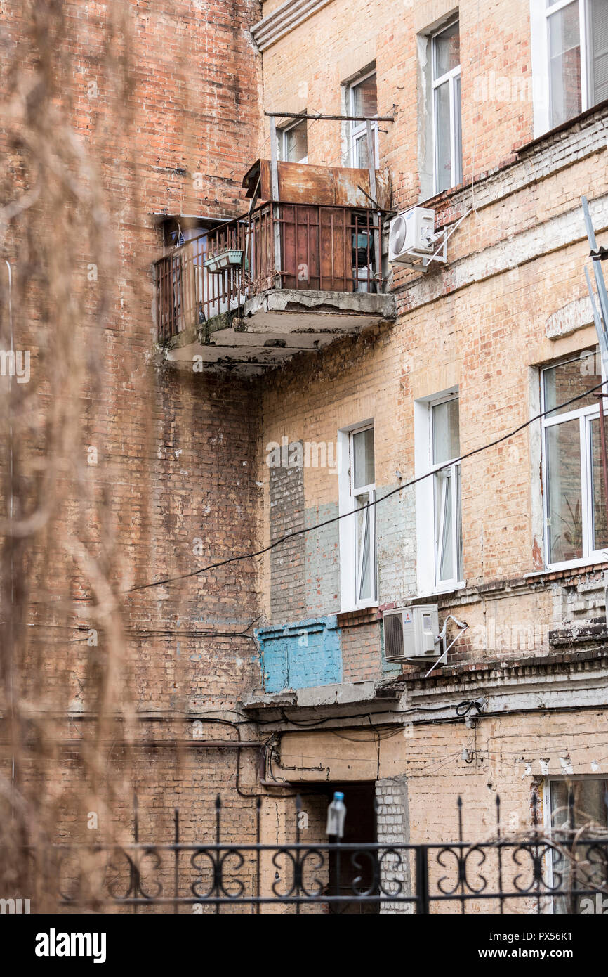 A balcony in a very bad shape in a courtyard Stock Photo - Alamy