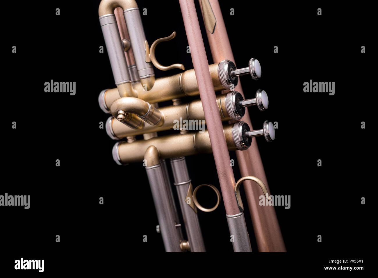 A tri color matt finish trumpet black background Stock Photo - Alamy