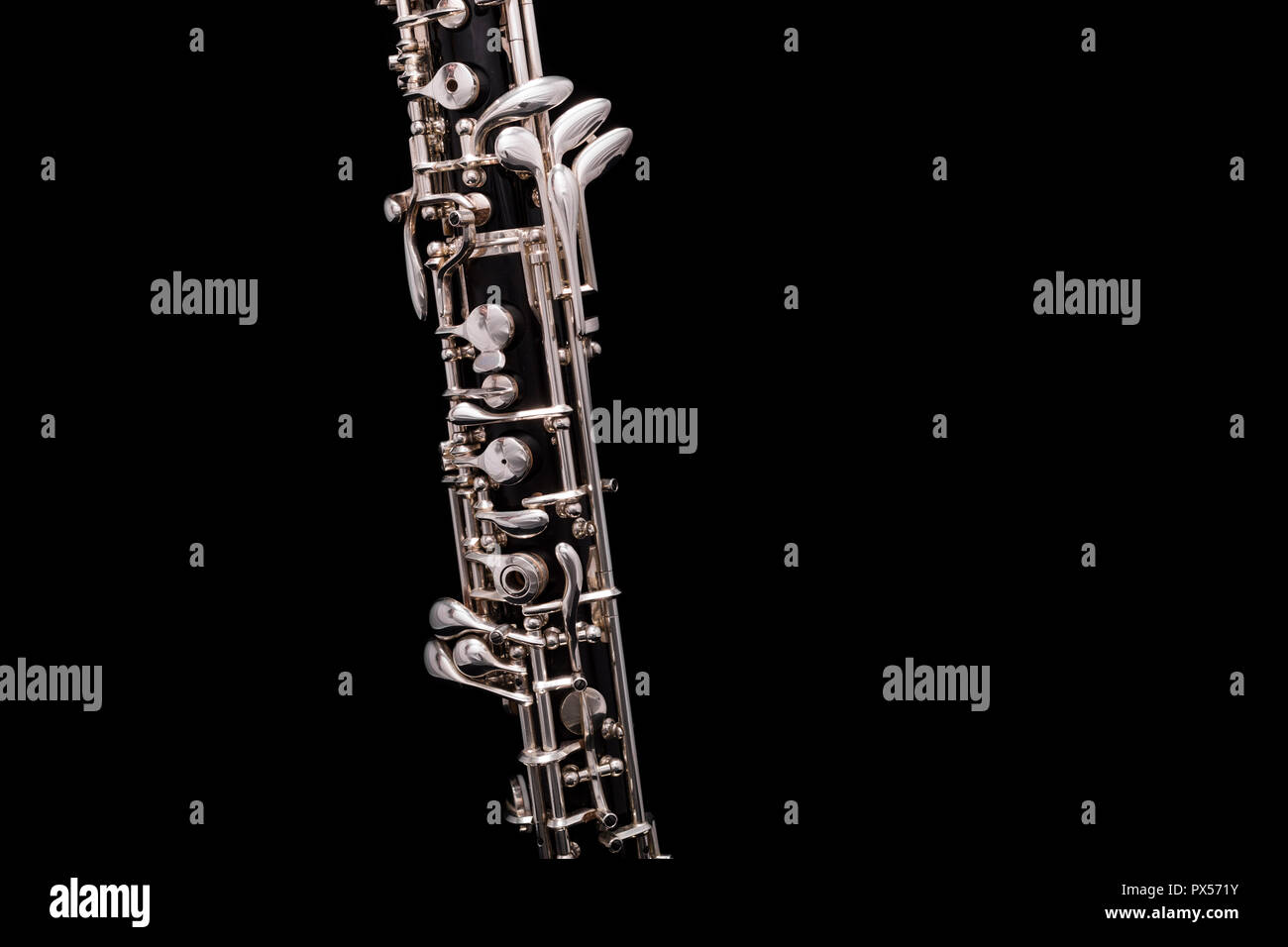 A black oboe with silver plated keys on a black background Stock Photo ...