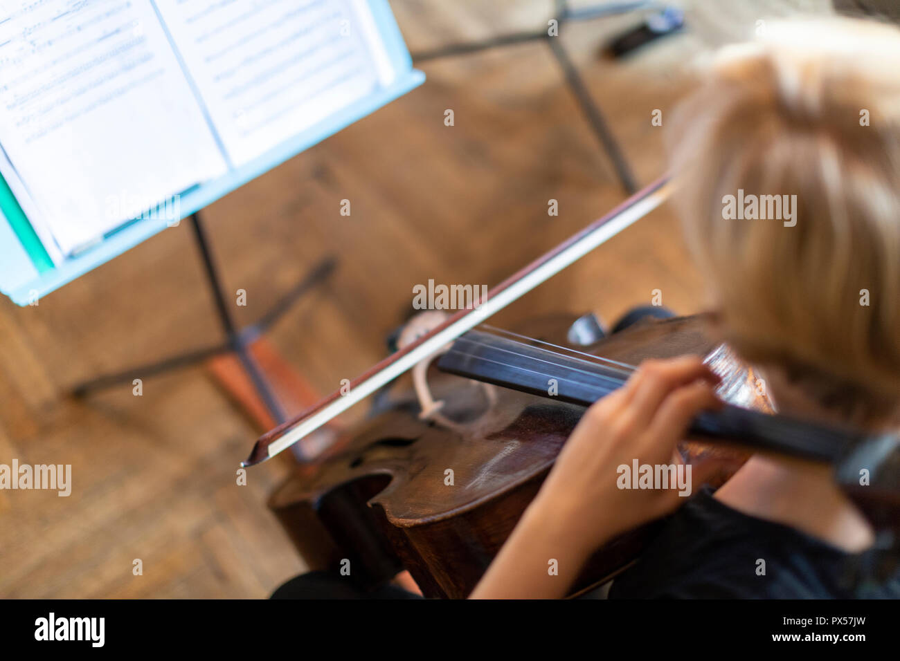 Person Playing The Cello Stock Photos & Person Playing The Cello Stock ...