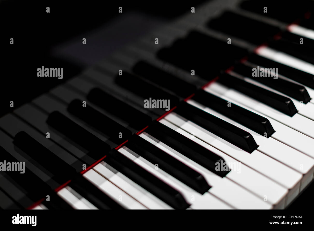 Keyboard of a grand piano Stock Photo - Alamy