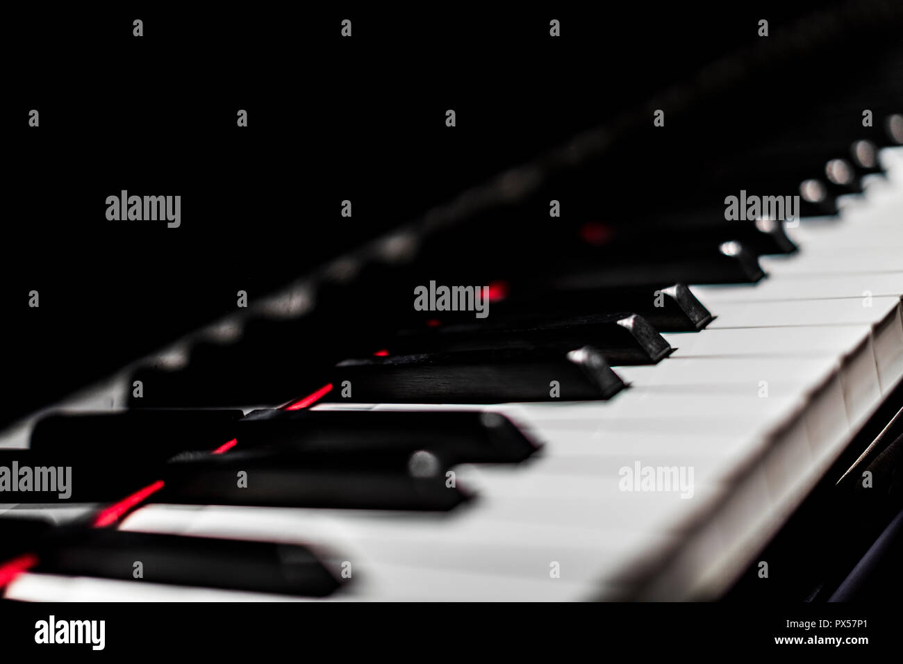 Keyboard of a grand piano Stock Photo - Alamy