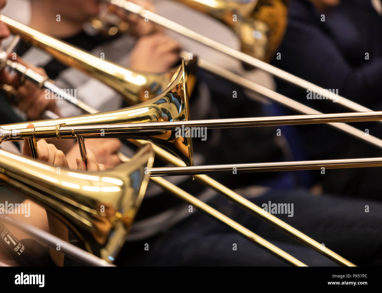 People playing the trombone during a rehearsal Stock Photo - Alamy