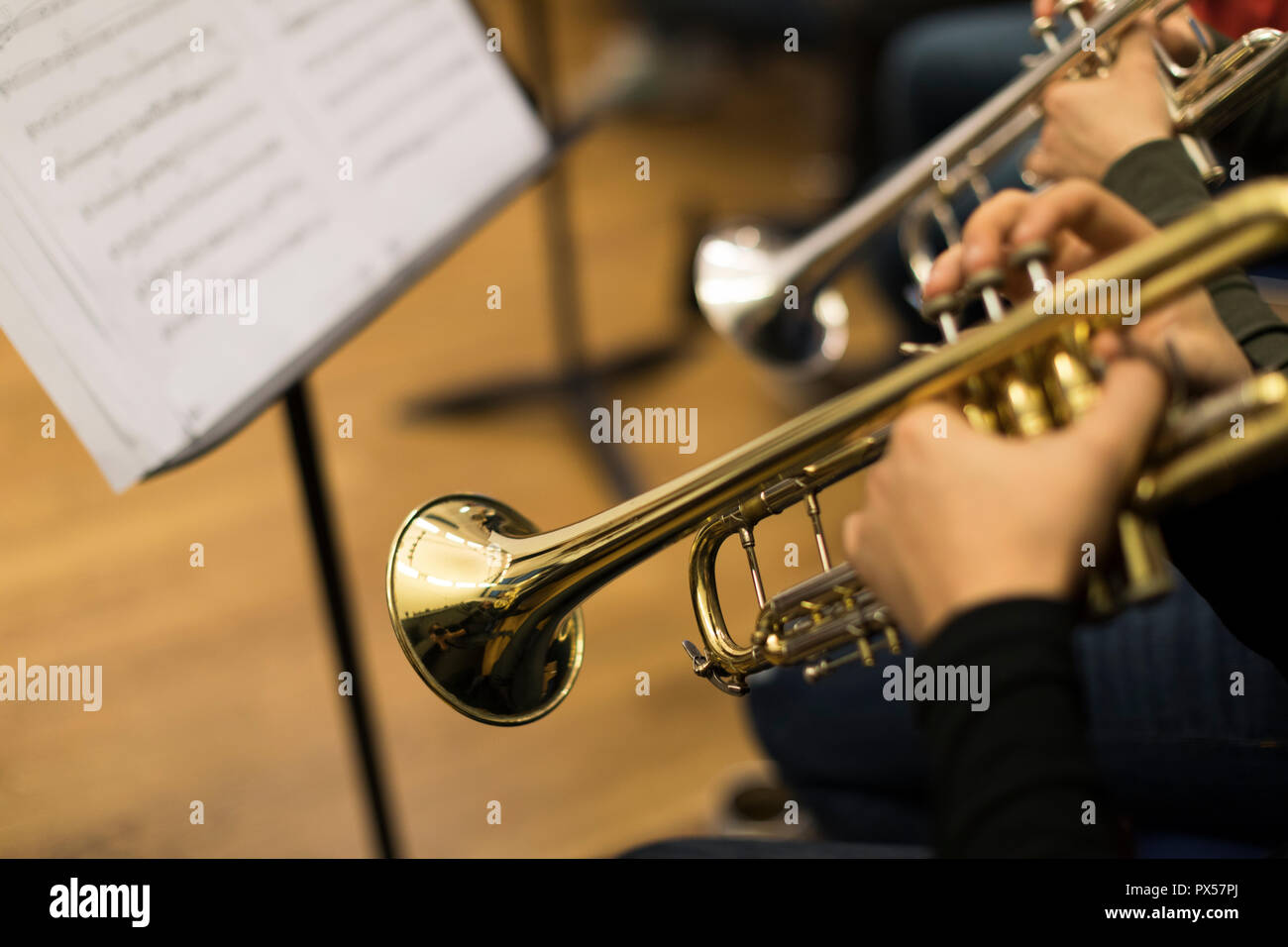 People playing the trumpet in rehearsal Stock Photo - Alamy