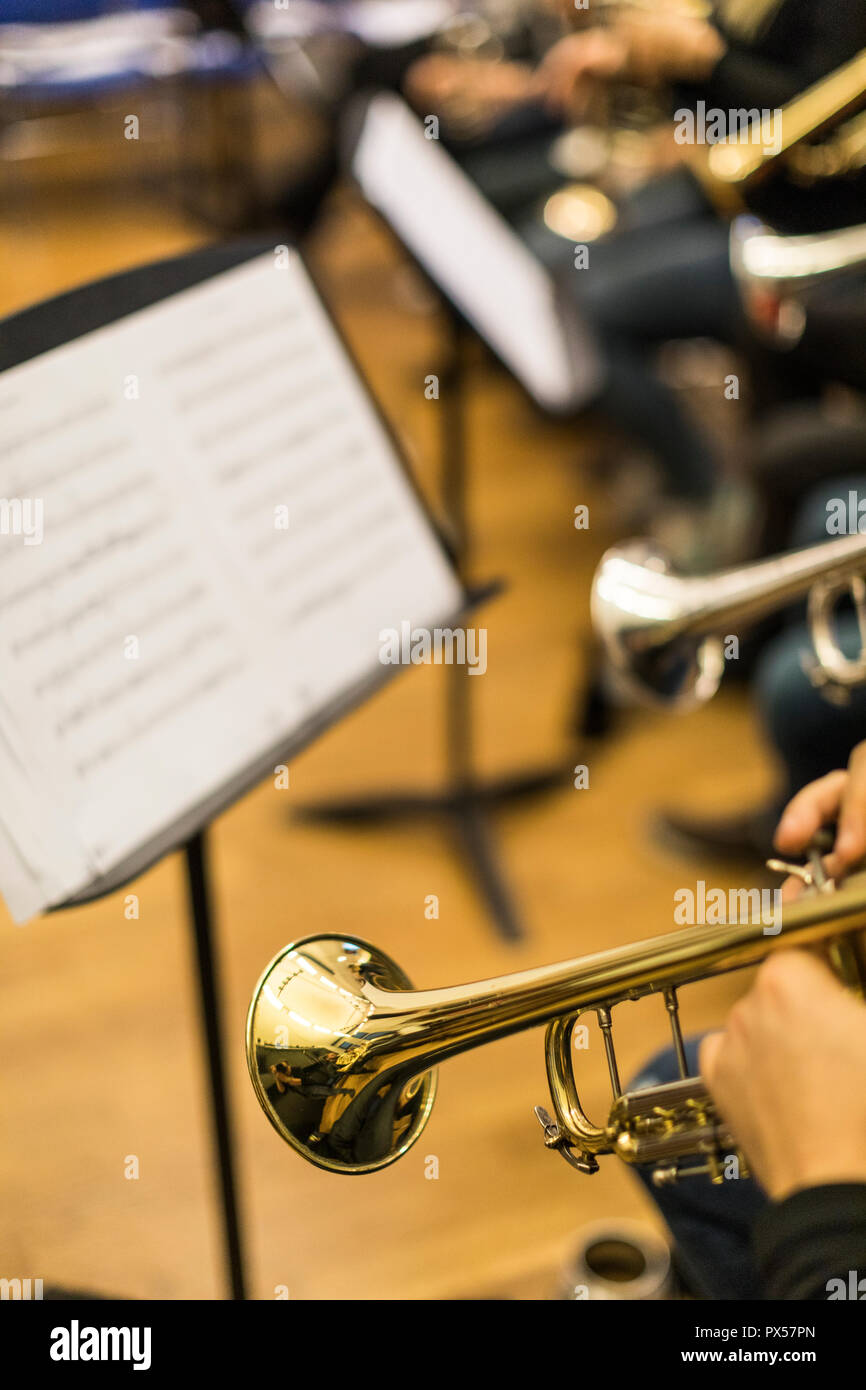 A person holding a trumpet Stock Photo - Alamy