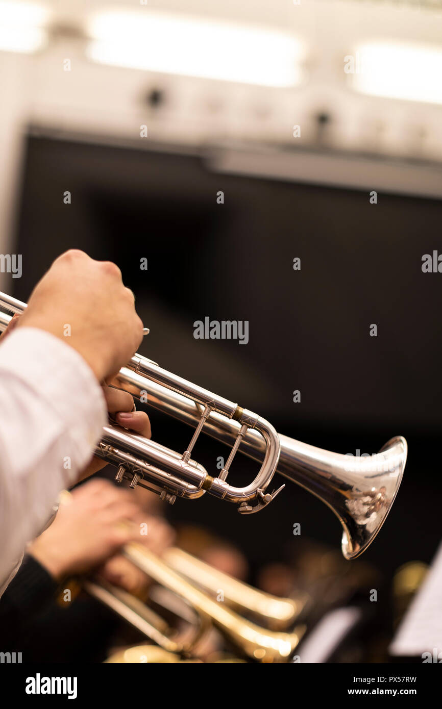 People playing the trumpet in rehearsal Stock Photo - Alamy