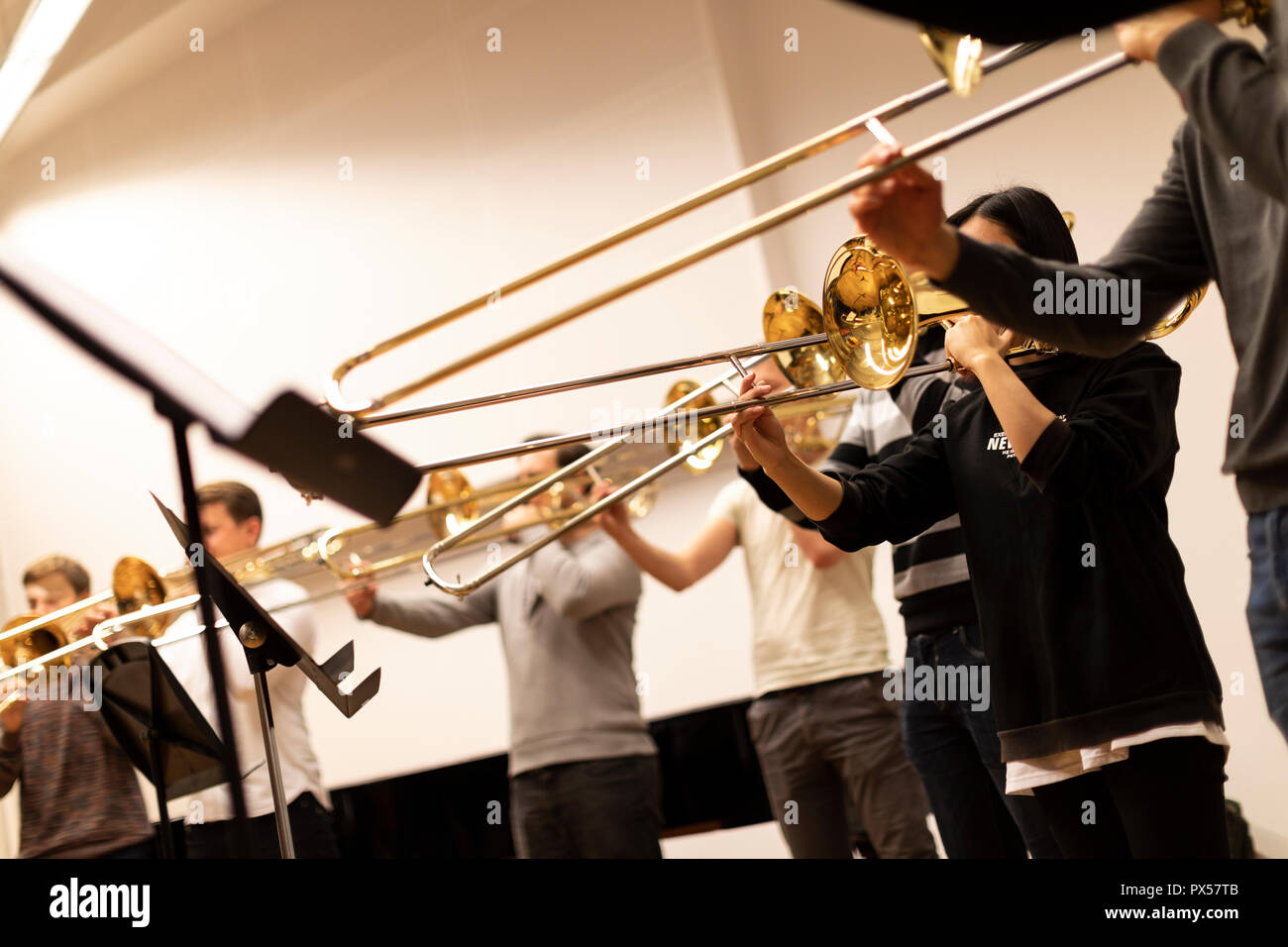 Many people playing the trombone Stock Photo - Alamy