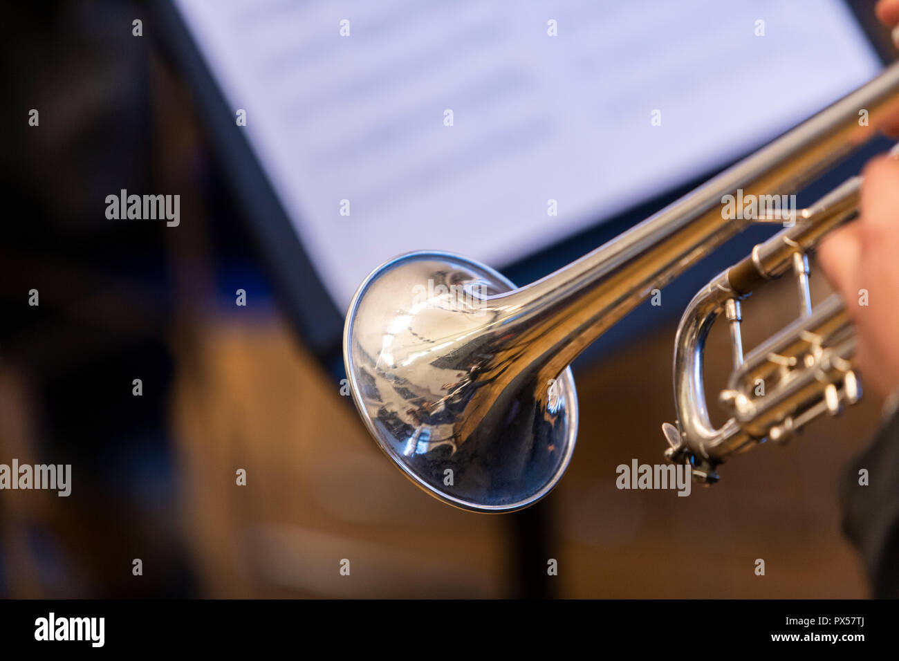 A person holding a trumpet Stock Photo - Alamy
