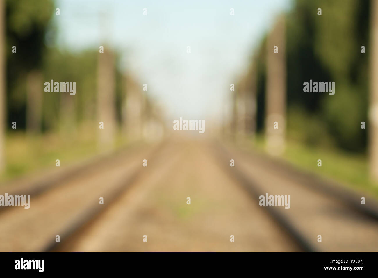 Abstract blurry railroad background. Defocused industrial landscape ...