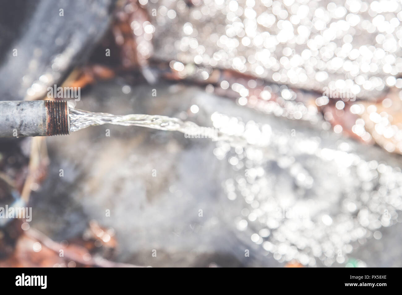 Water running out pipe hi-res stock photography and images - Alamy