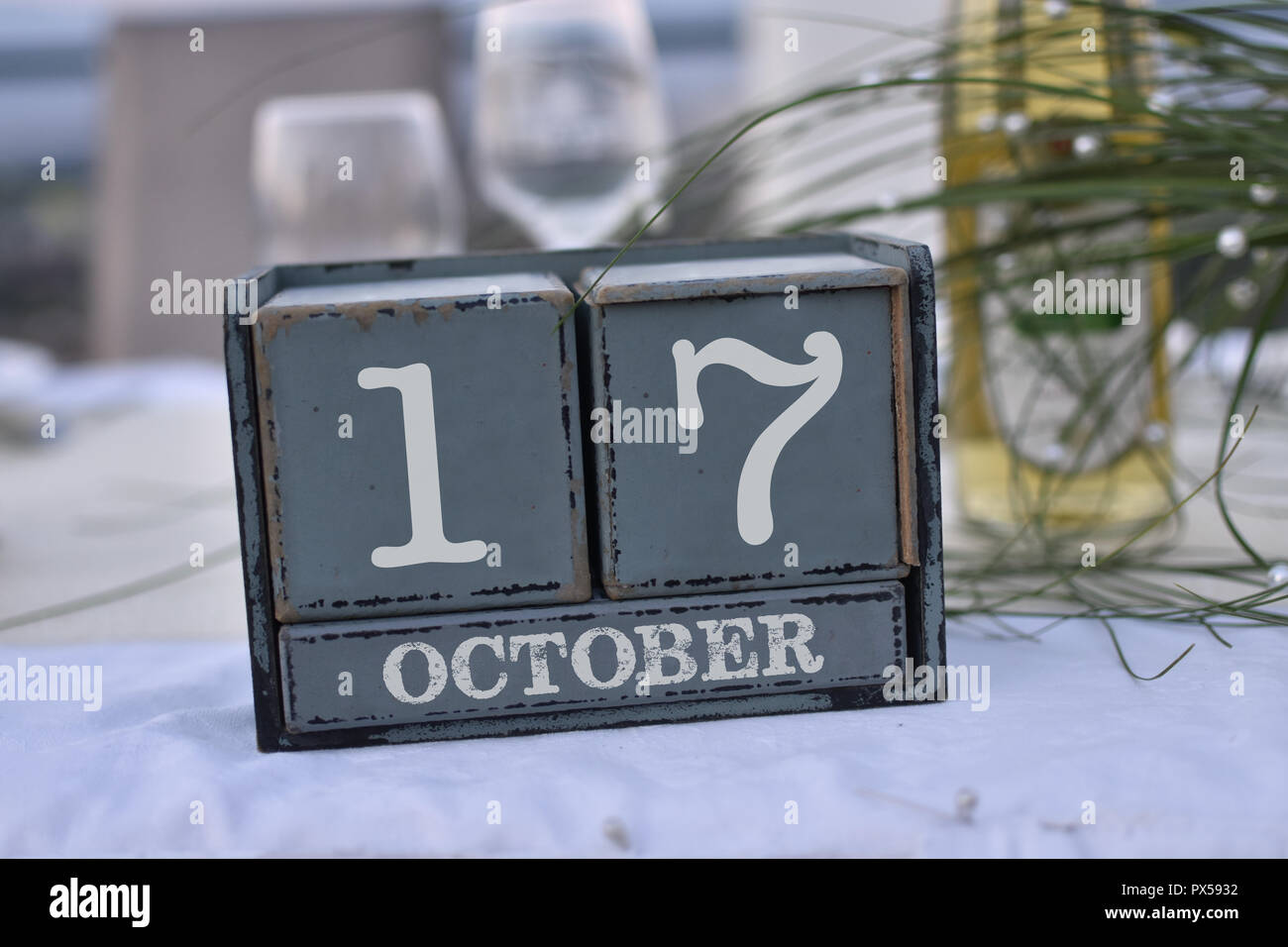 Wood blocks in box with date, day and month 17 October. Wooden blocks ...