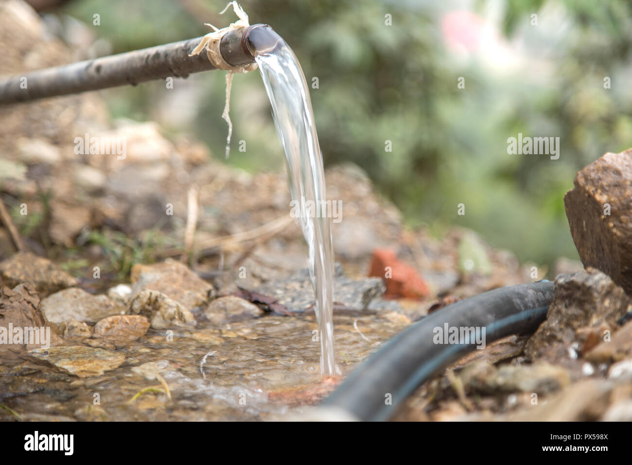 Water Flowing From Pipe Stock Photos & Water Flowing From Pipe Stock ...
