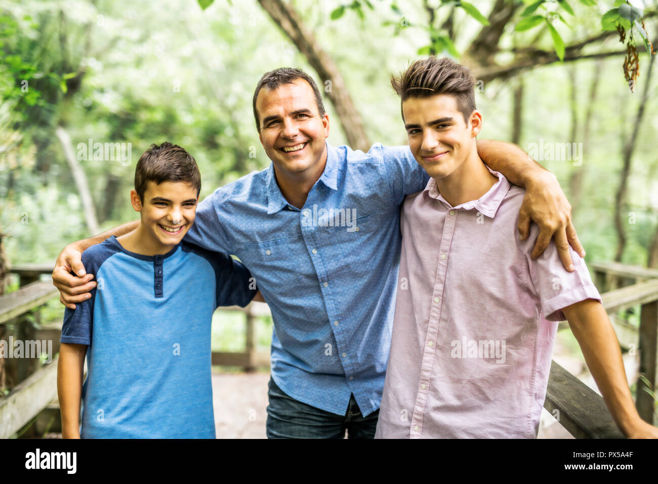 Man and two sons hi-res stock photography and images - Alamy