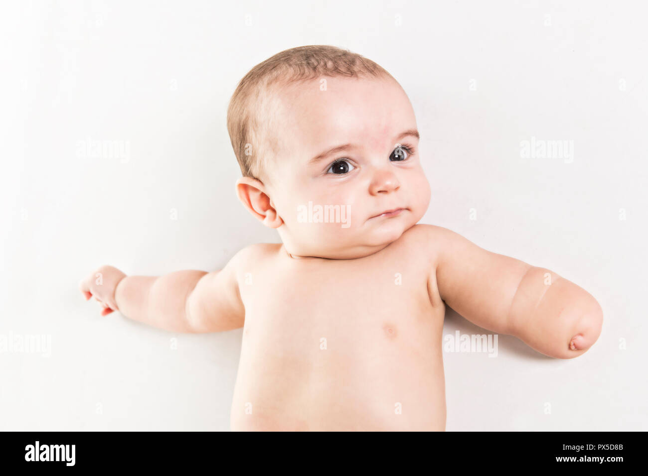 One hand Baby boy portrait on white background lay Stock Photo - Alamy
