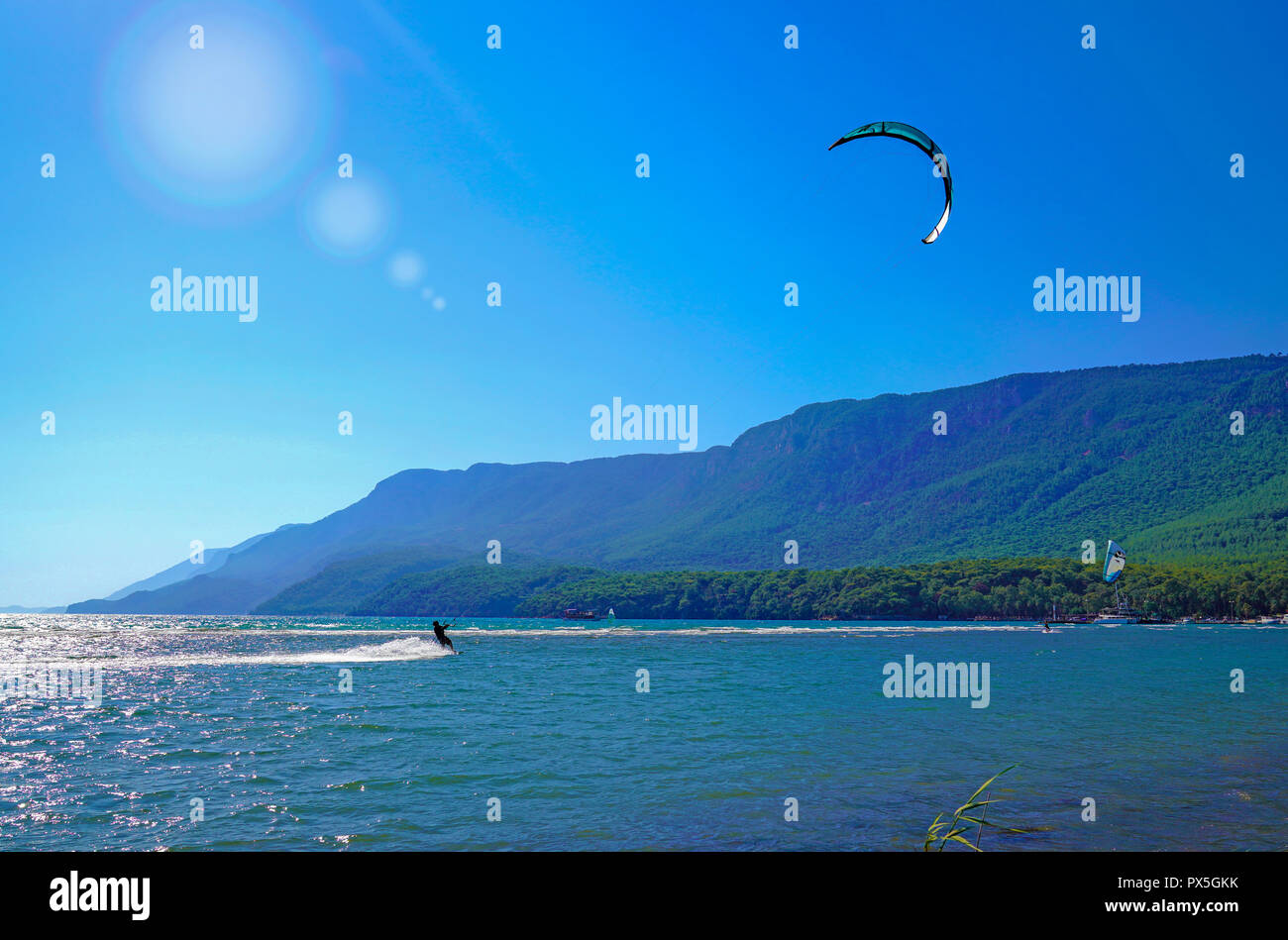 Akyaka, Mugla/Turkey-August 14 2018: Surfer enjoying kite surfing at ...