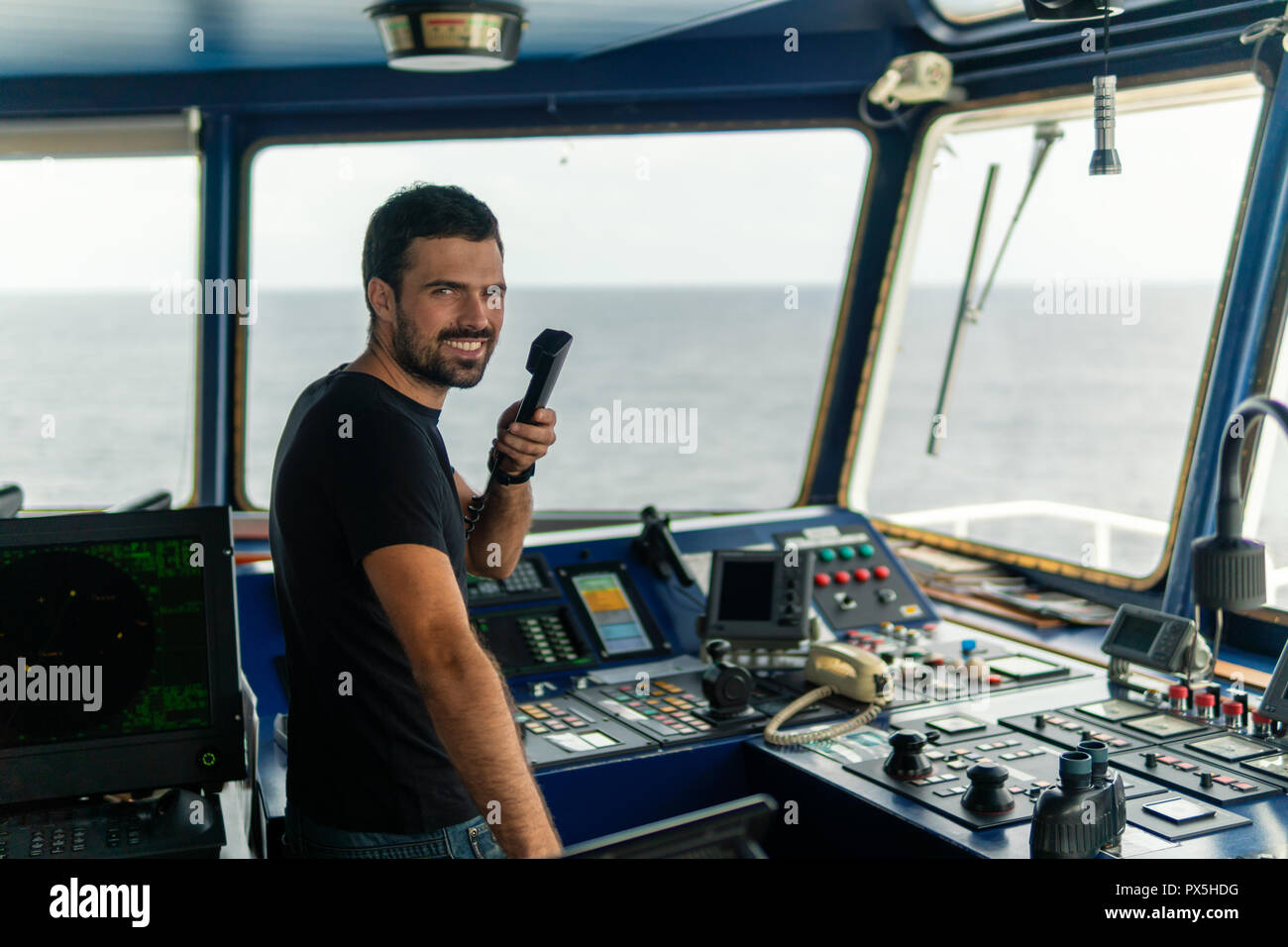 Marine navigational officer is reporting by VHF radio Stock Photo - Alamy