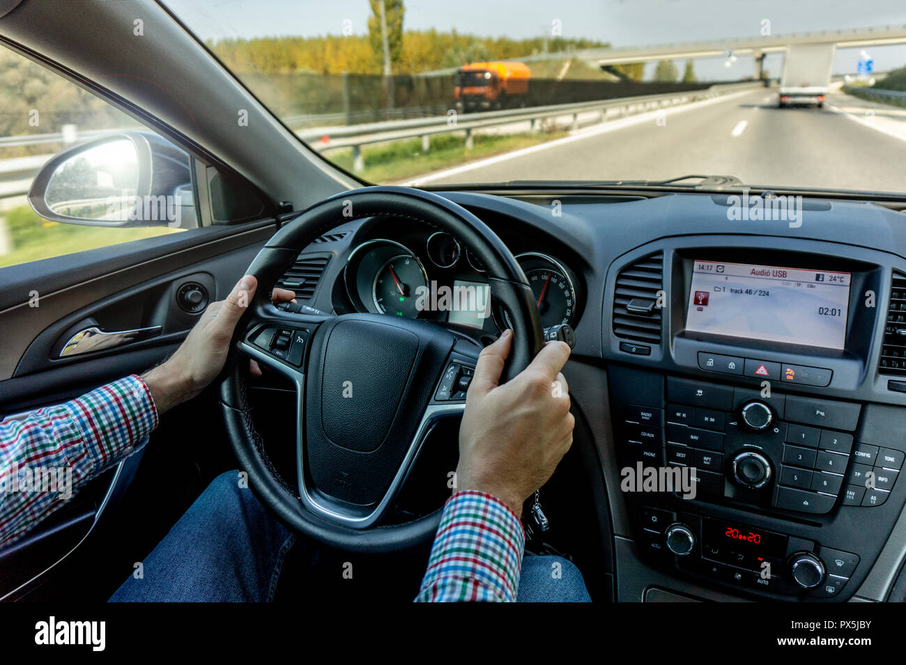 Driver driving on the highway view from the car go ahead in one ...