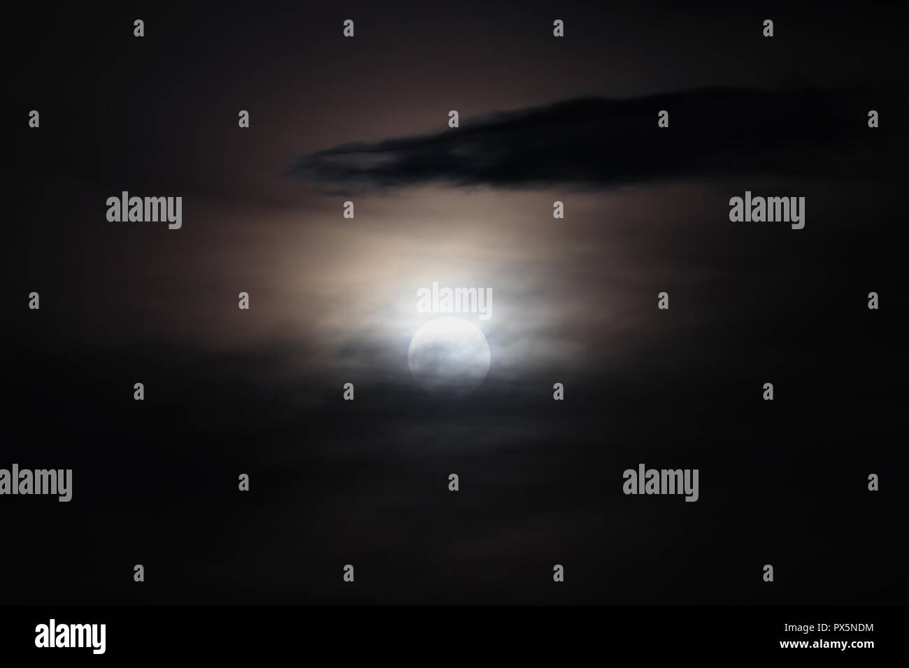 Full moon beautiful over dark black sky at have raincloud in night ...