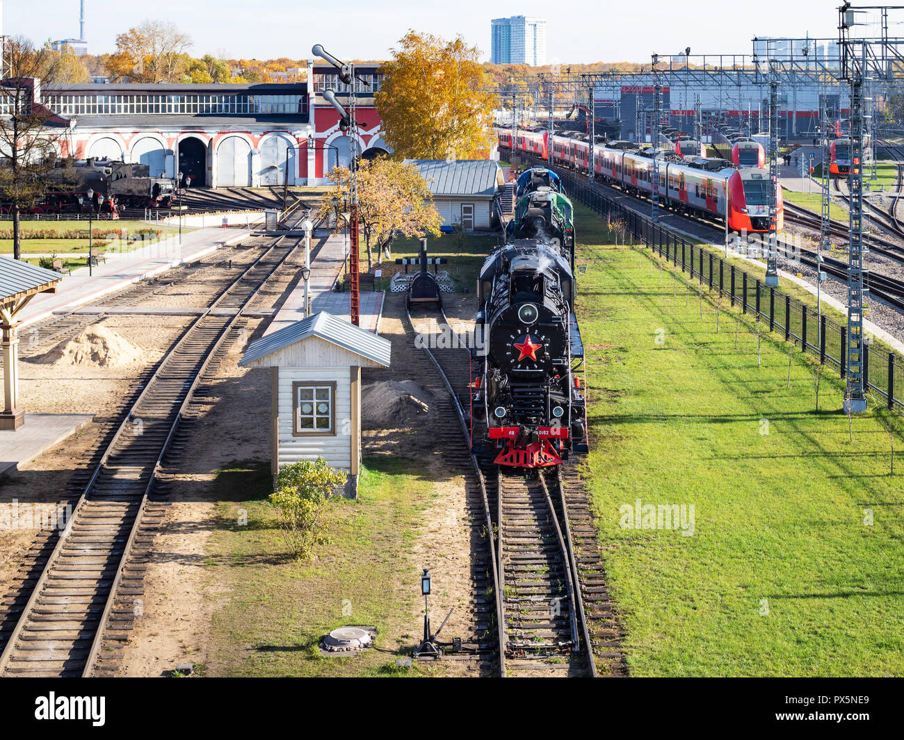 Steam locomotive and railcar of the museum railway hi-res stock ...