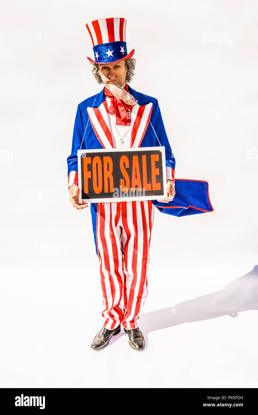 Uncle Sam character with a "For Sale" sign around his neck. Concept of ...