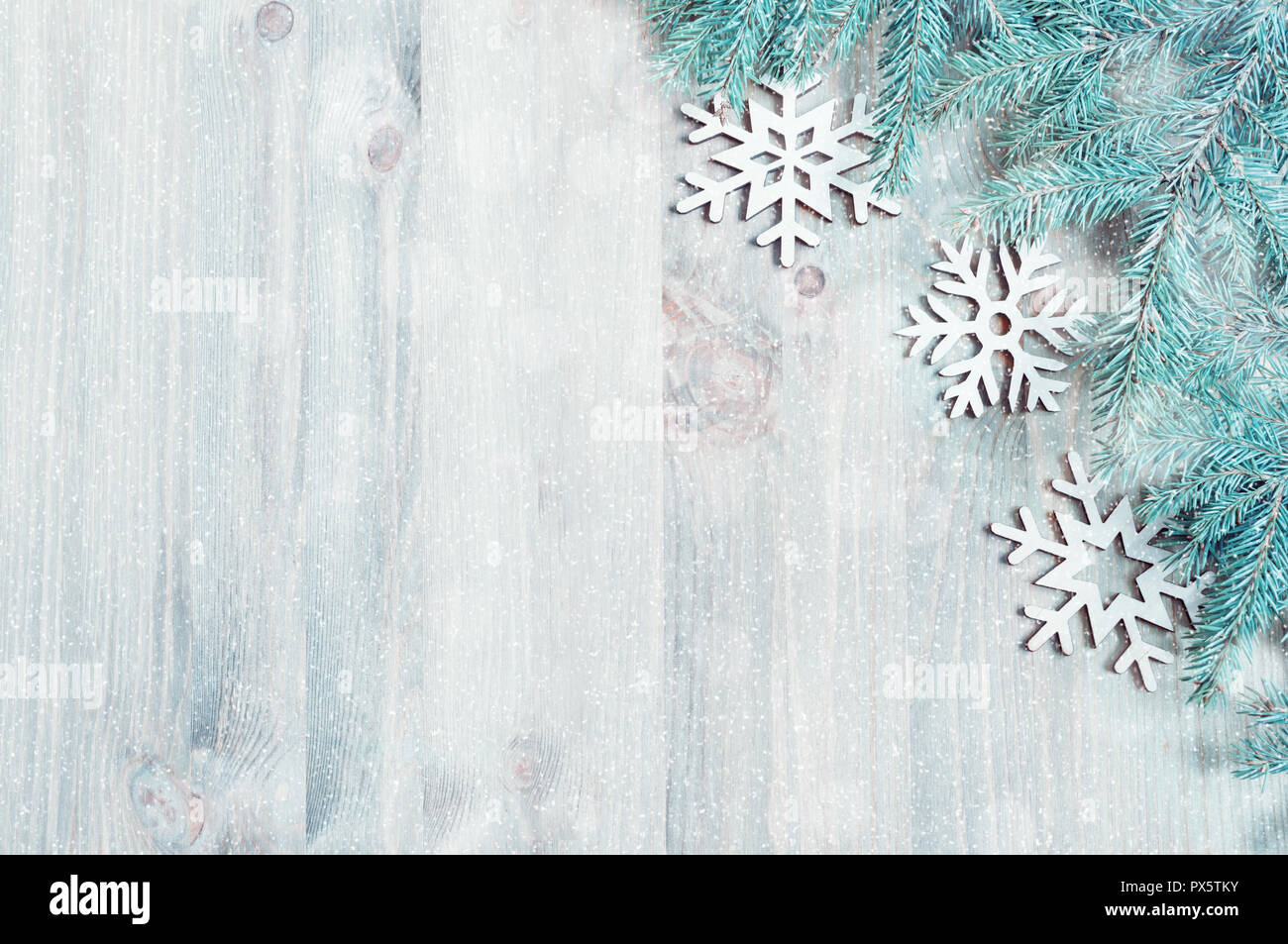 New Year and Christmas background. Christmas toys, blue fir tree ...