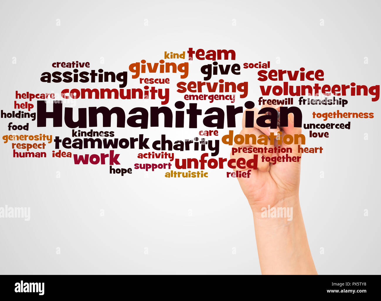 Humanitarian word cloud and hand with marker concept on gradient ...
