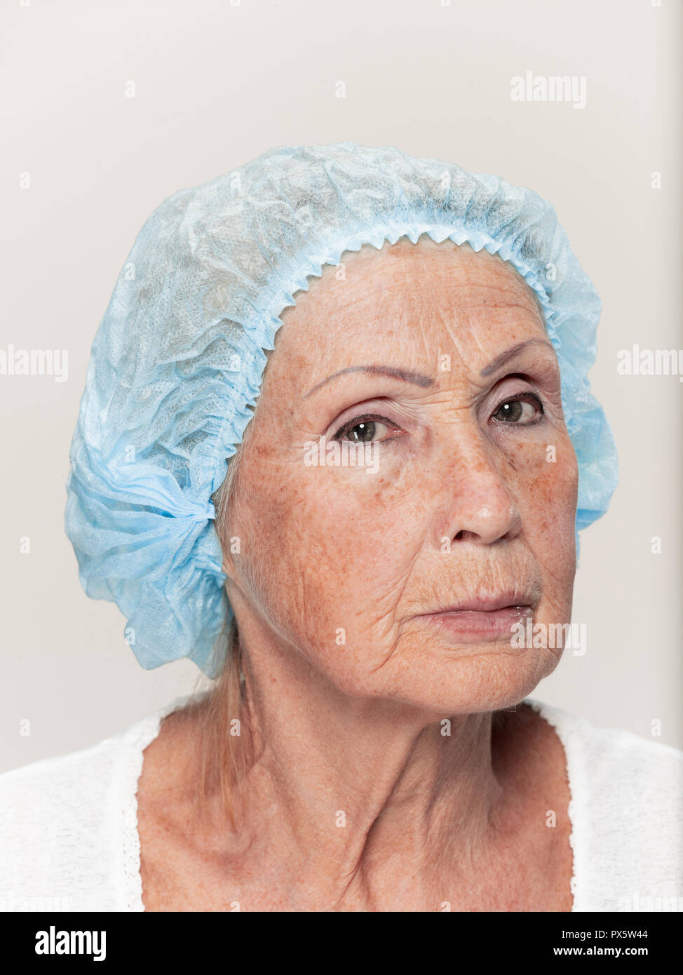 The face of mid age woman before plastic surgery. Senior female model ...