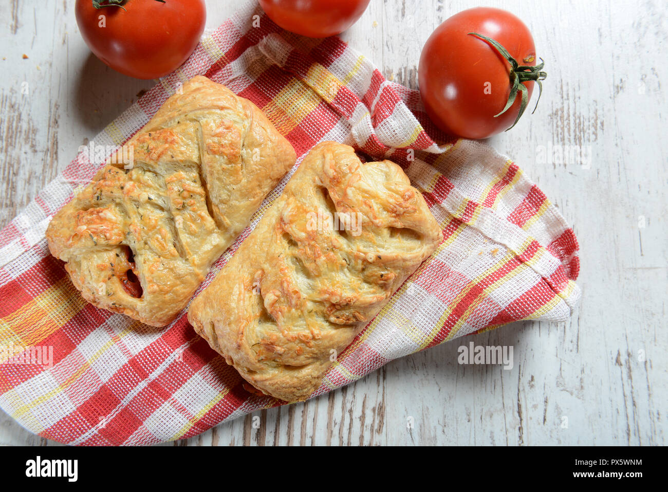 Crusty rolls stuffed with tomatoes and cheese Stock Photo - Alamy