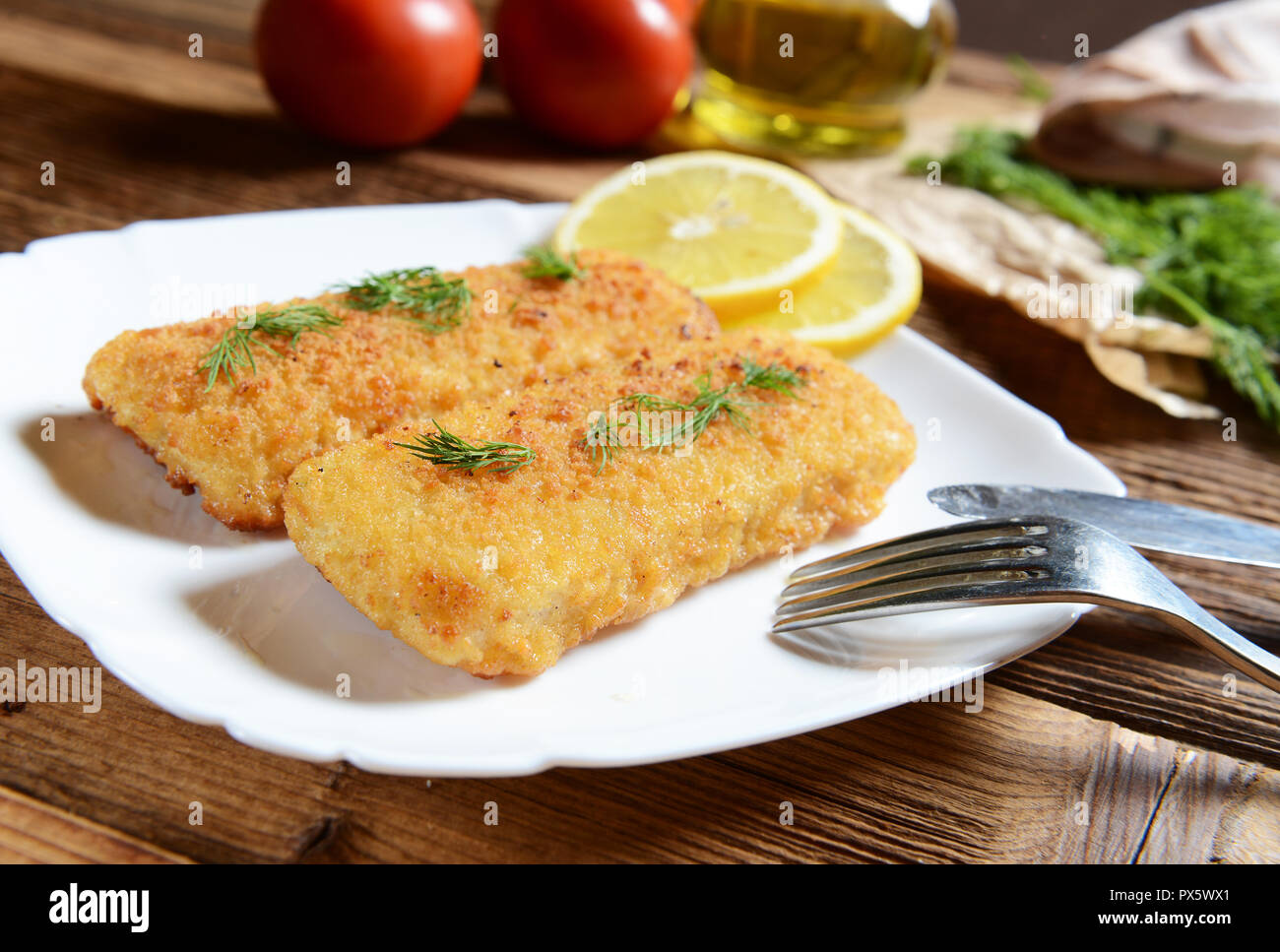 Fish fillets with chese Stock Photo - Alamy