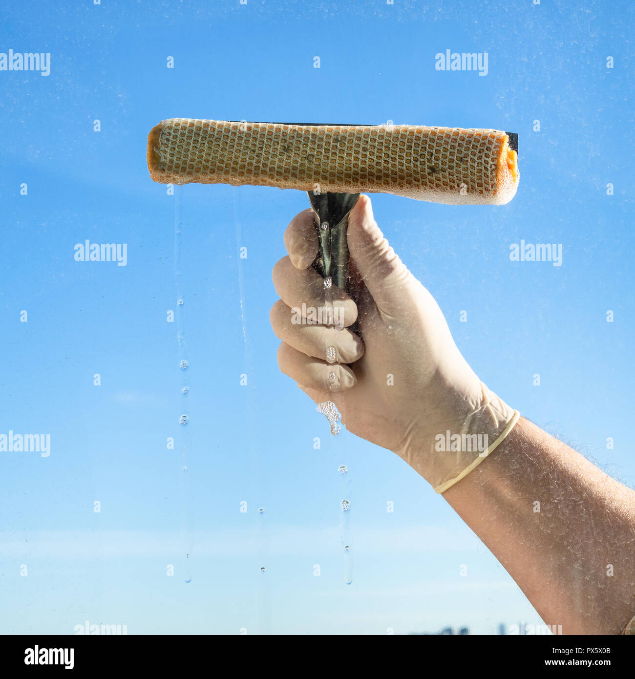 Hand wipes window hi-res stock photography and images - Alamy