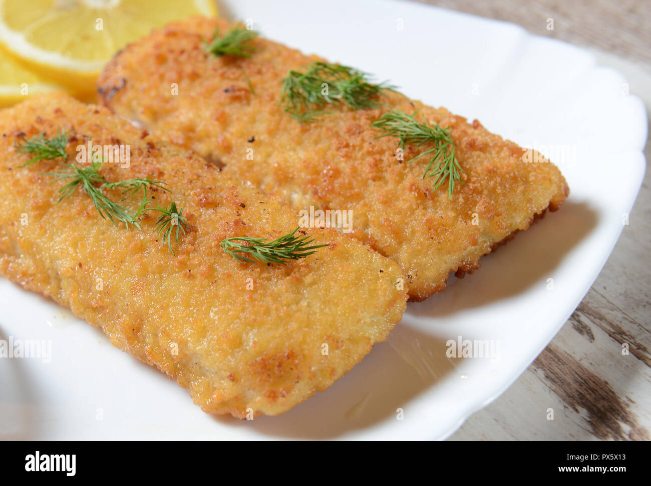 Fish fillets with chese Stock Photo - Alamy