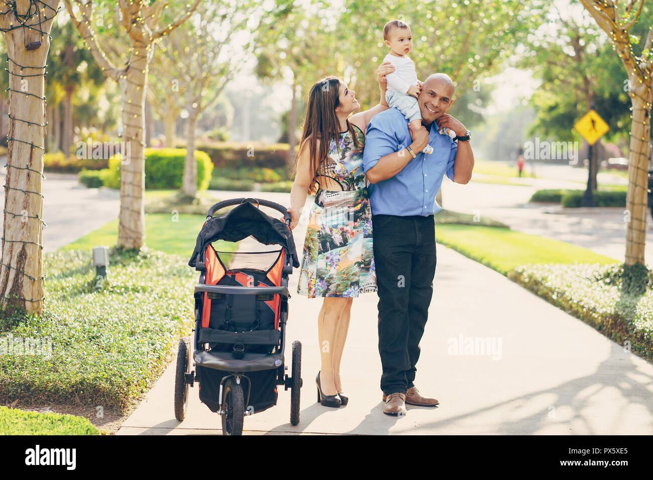 family on a walk Stock Photo - Alamy