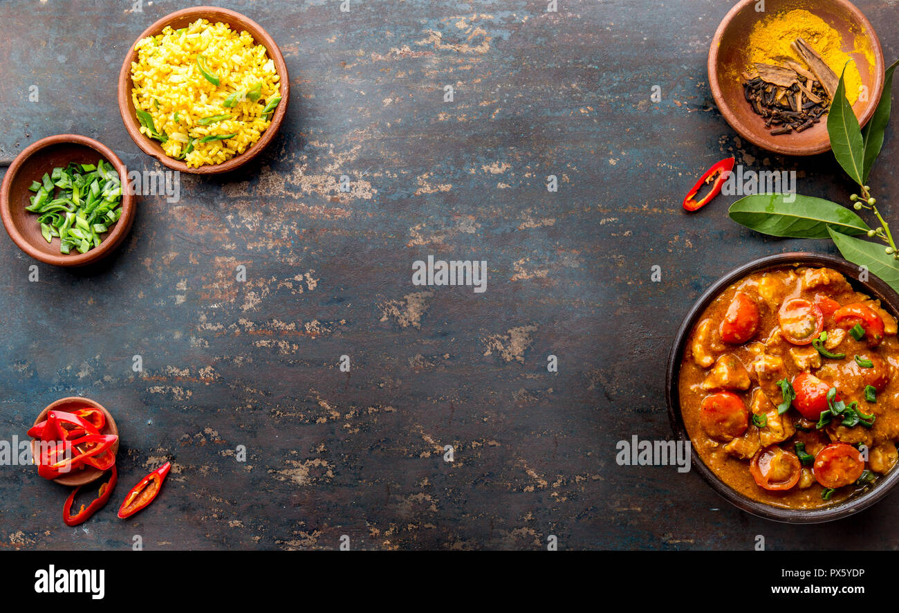 INDIAN FOOD. ROGAN JOSH curry sauce. Pork rogan josh with rice Stock ...