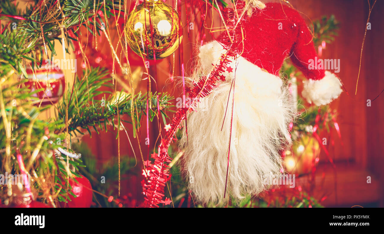 christmas tree with its balls its garlands and Santa Claus Stock Photo ...