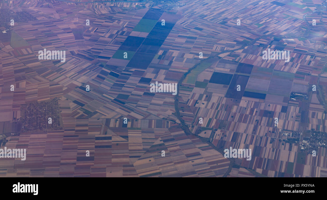 Agricultural fields from above. Aerial view out of a plane window Stock ...