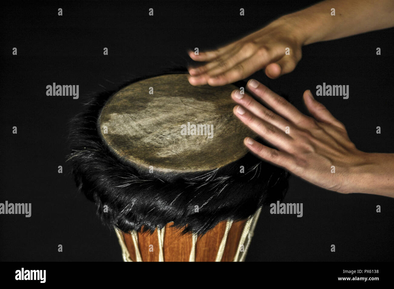 Hands playing drums Stock Photo - Alamy