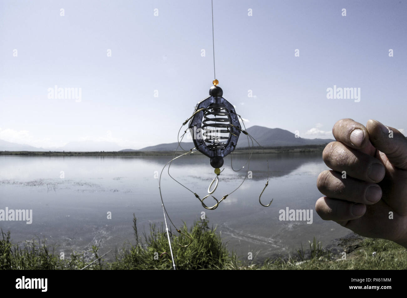Lake, fishing catch, Romania, Transsilvania, Brasov area Stock Photo ...