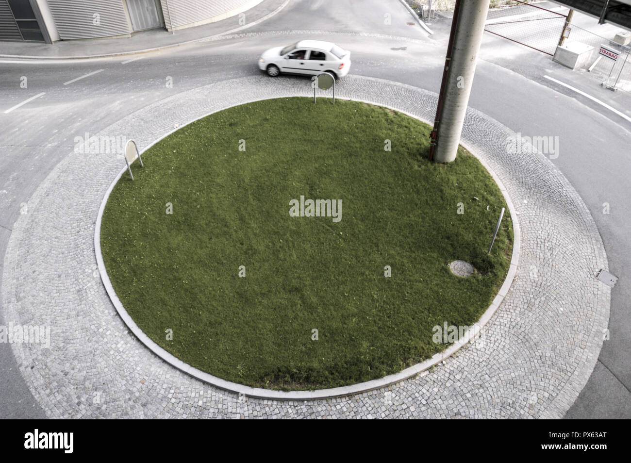 Car in roundabout Stock Photo - Alamy