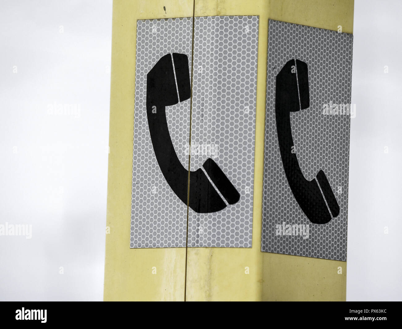 Symbol telephone box Stock Photo - Alamy