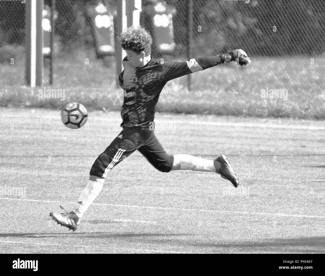 Soccer kick green Black and White Stock Photos & Images - Alamy