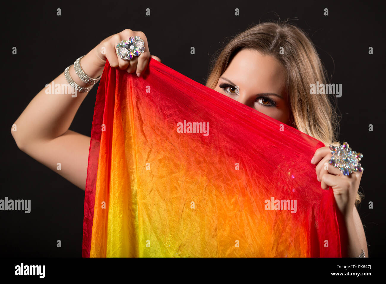Image of beautiful belly dancer holding veil Stock Photo - Alamy