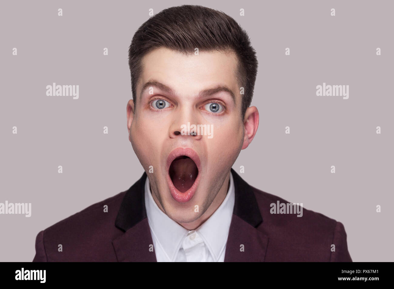Shocked man suit hi-res stock photography and images - Alamy