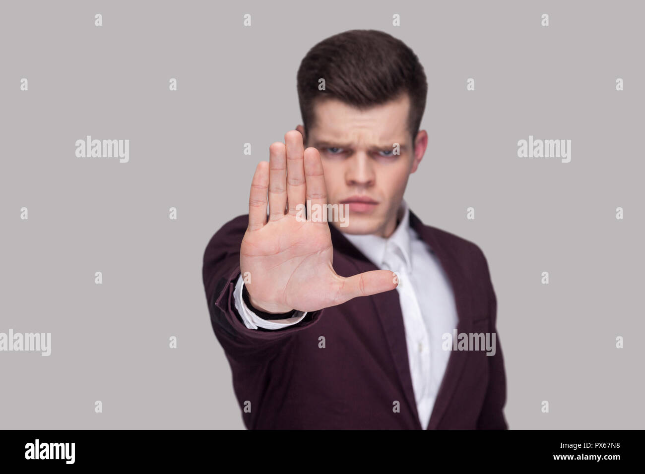 Businessman blocking camera hand hi-res stock photography and images ...