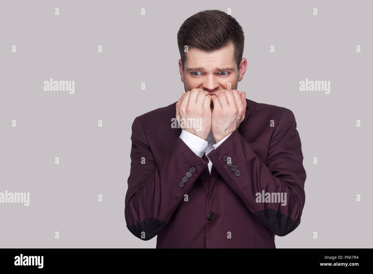 Man bitting hi-res stock photography and images - Alamy