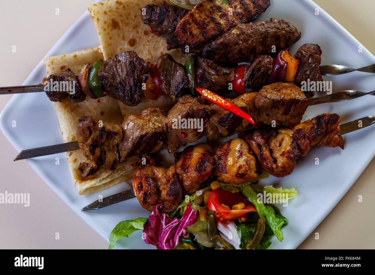 Barbeque meat mix plate with vegetalbes Stock Photo - Alamy