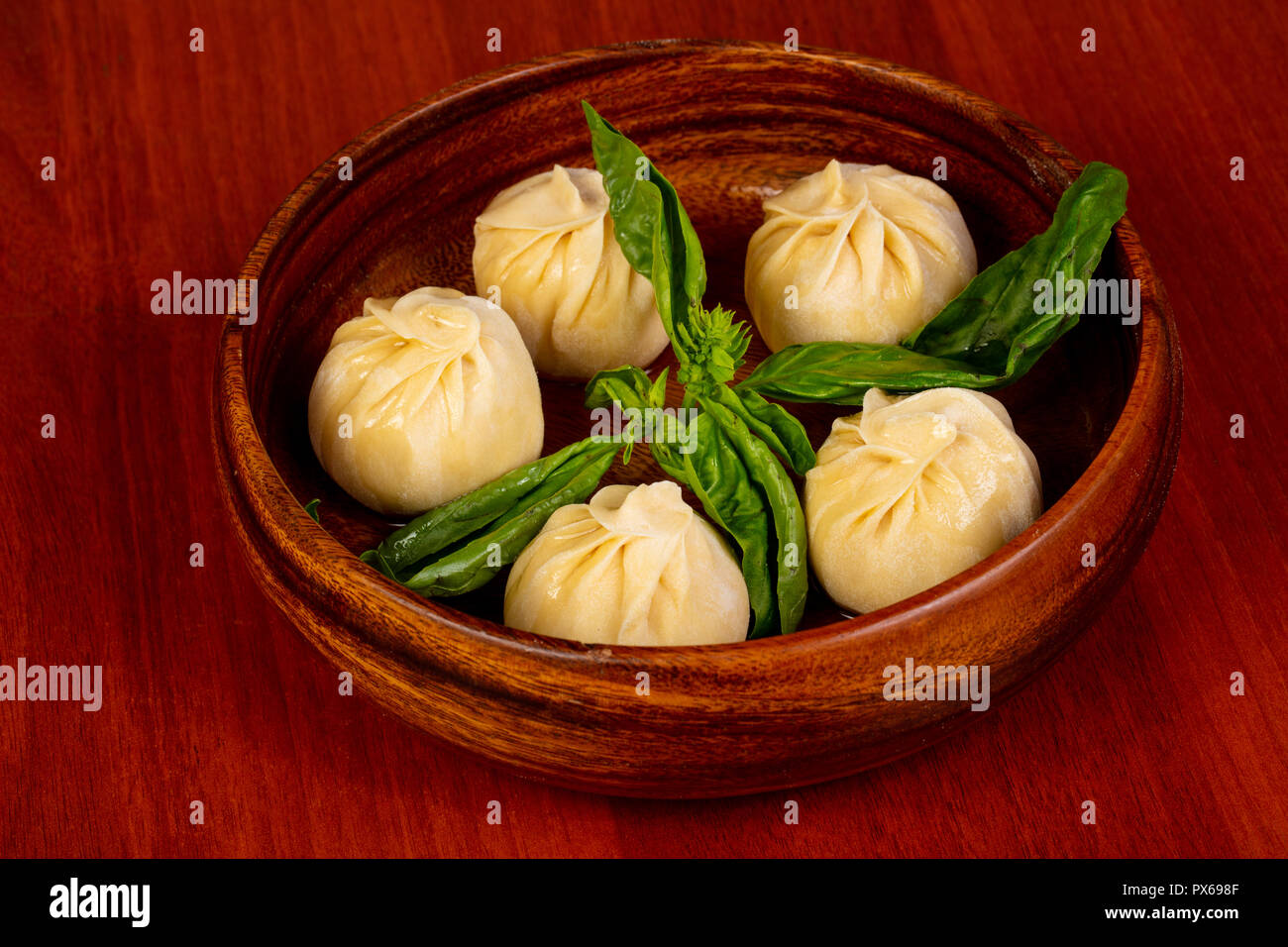 Uzbek traditional dumplings - Manti with meat Stock Photo - Alamy
