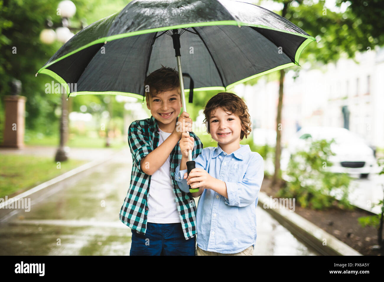 Two boys water park in hi-res stock photography and images - Alamy