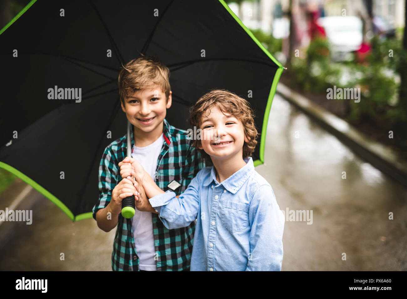 Two boys water park in hi-res stock photography and images - Alamy