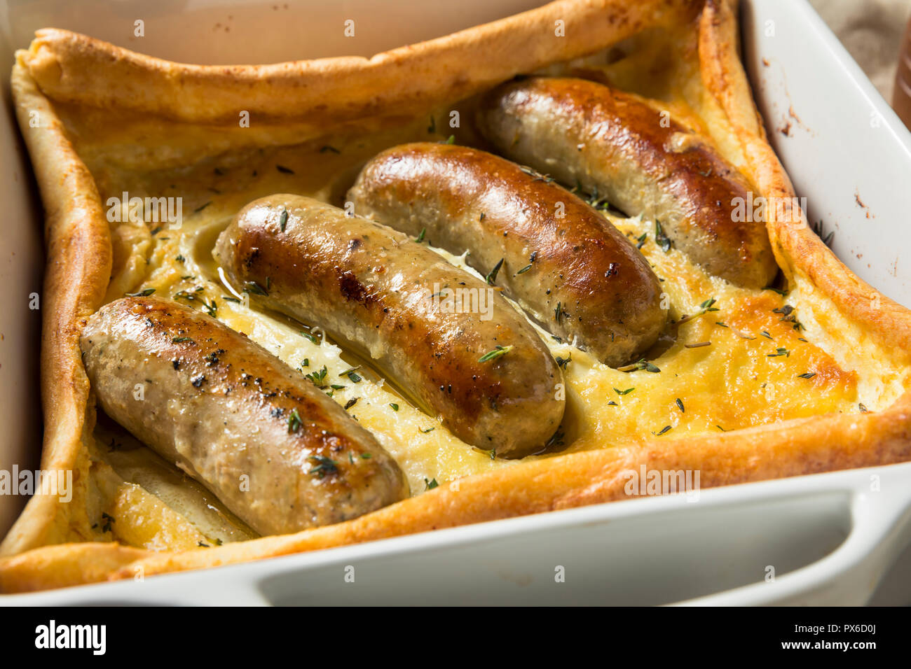 Homemade English Toad in the Hole Ready to Eat Stock Photo - Alamy